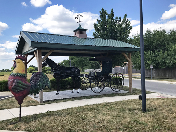 A covered buggy stand complete with rooster decoration&mdash;Grabill's version of a parking garage with countryside flair.