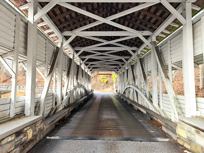 Knox Covered Bridge invites you into its crimson tunnel&mdash;like walking through a time portal where horse-drawn carriages still make sense.