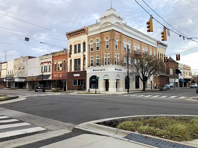 Morning light plays across Kinston's historic buildings, where retirement dreams find affordable foundations.