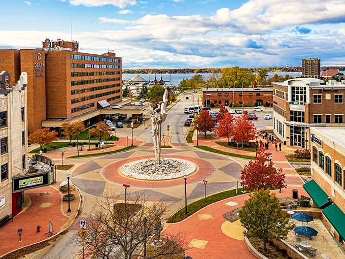 Fall colors frame Muskegon's riverfront park, where urban development meets natural beauty in perfect harmony.