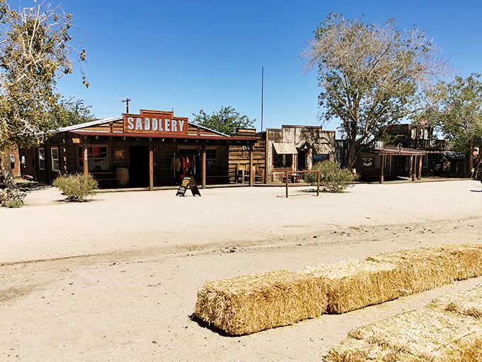 The Wild West lives on in Pioneertown, where hay bales and hitching posts aren't ironic design choices but practical necessities.