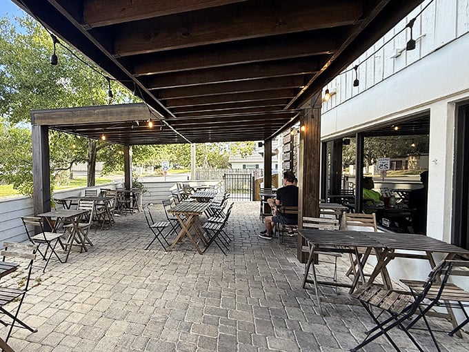 The outdoor patio at Pizza Bruno invites you to savor wood-fired perfection under the Florida sky. Simple tables, extraordinary pizza.