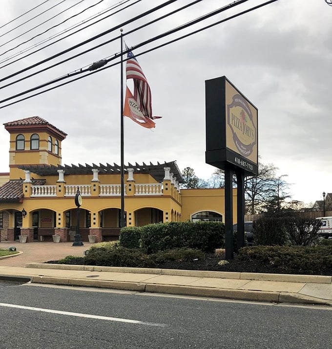 The distinctive yellow building of Pizza John's can't be missed. This architectural statement houses some of Maryland's most beloved pies.