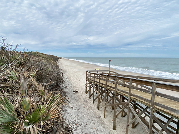 Sunset at Playalinda paints the beach in amber light, turning ordinary sand into treasure beneath your feet.