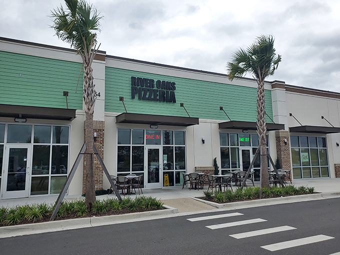 That mint-green exterior isn't just pretty&mdash;it's a signal that something fresh and different awaits inside this Myrtle Beach pizza haven.