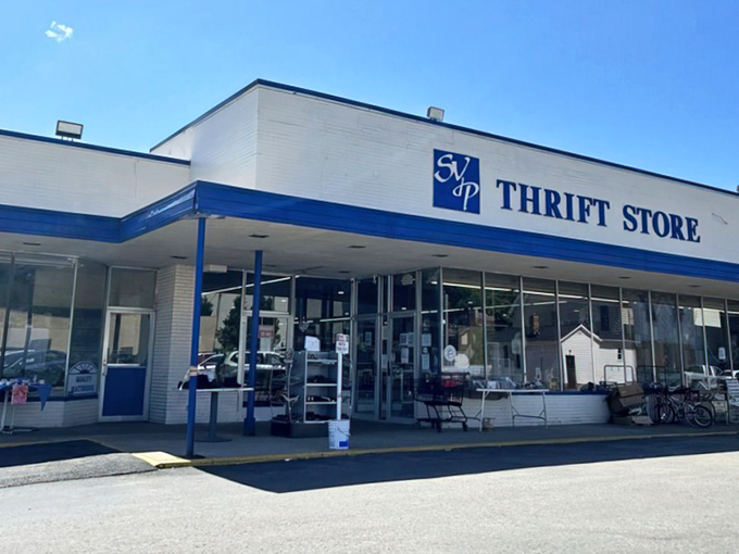 The clean, welcoming entrance promises organized shopping where every purchase helps your neighbors too.