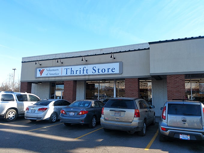 Morning light catches the Volunteers of America sign &ndash; where early birds get the best vintage worms and support worthy causes.