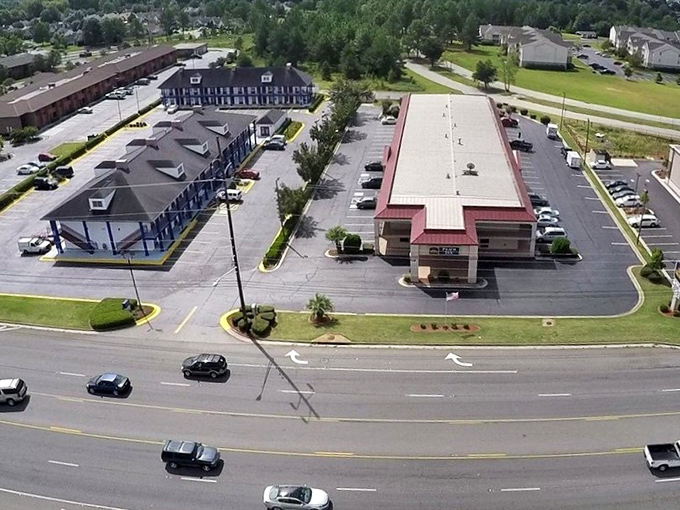 The practical side of retirement living in Warner Robins: convenient shopping centers and ample parking. No parallel parking nightmares here!