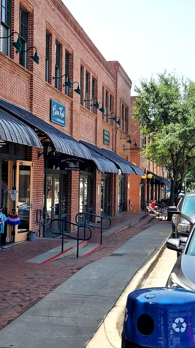 Blue awnings line this historic brick building, housing sandwich magic that's been perfected over years of delicious dedication. 