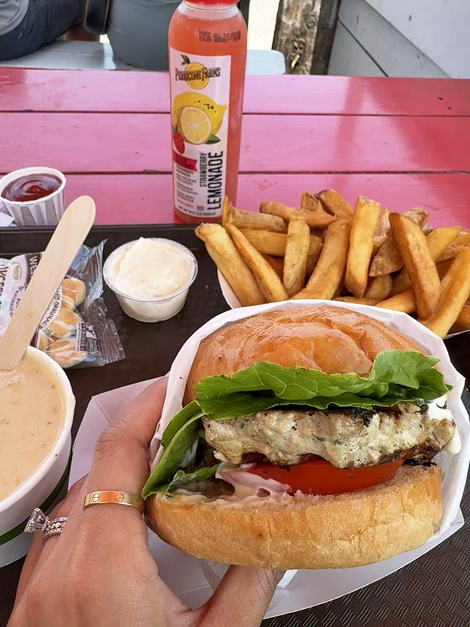 A perfectly grilled fish sandwich with all the fixings alongside crispy fries. Proof that sometimes the simple things in life truly are the best.