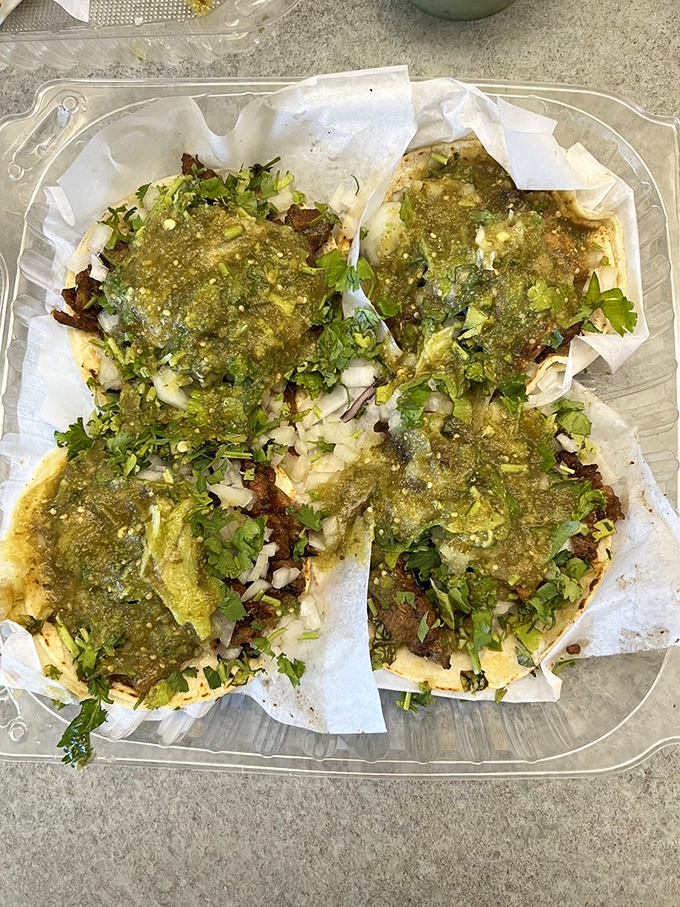 Al Pastor tacos arrive like edible love letters, each bite delivering sweet pineapple and perfectly spiced pork