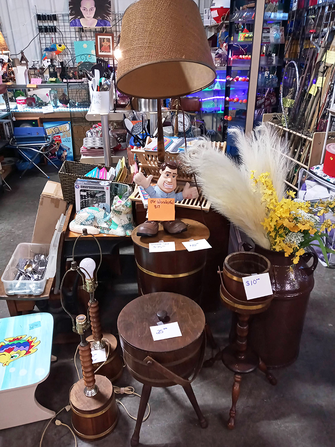 Fred Flintstone would approve of this eclectic collection where vintage lamps, wooden barrels, and quirky figurines create a time-traveler's paradise.