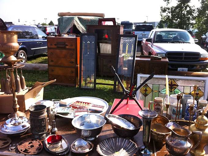 Antique silver catches morning light while furniture waits patiently in the background&mdash;each piece whispering stories of dinners past.