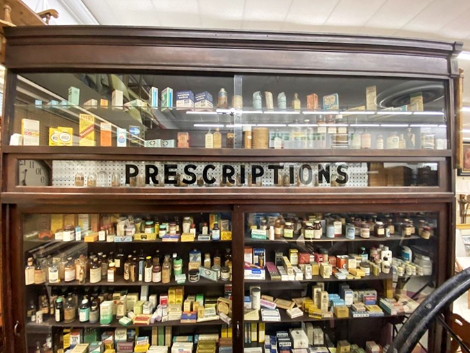Not just any antique, this vintage pharmacy cabinet showcases medicine bottles from when "patent medicine" meant something entirely different. A museum-worthy piece with historical prescriptions included!