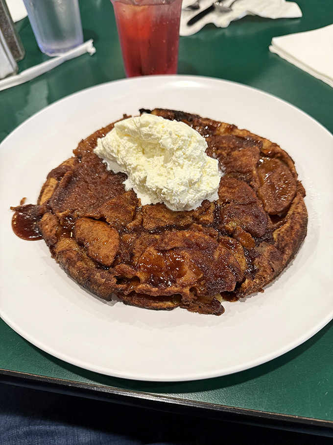 Not just a pancake&mdash;it's an architectural marvel with whipped cream clouds. Breakfast or dessert? Why choose?