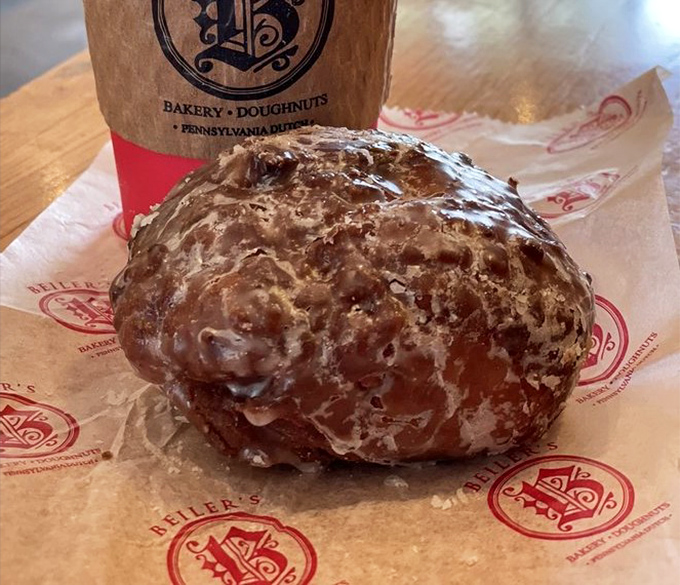Not all heroes wear capes; some come wrapped in wax paper. This apple fritter has more layers than your favorite prestige TV drama.