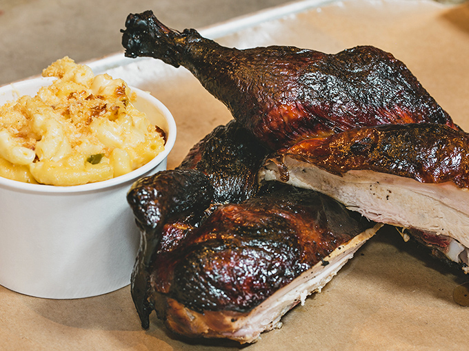 This smoked chicken defies the "boring barbecue poultry" stereotype, with skin crispier than a fresh dollar bill and meat juicier than gossip.