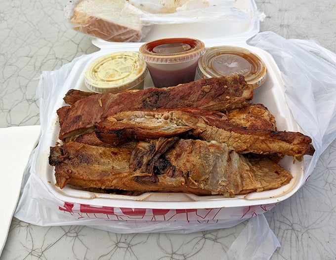 These ribs aren't falling off the bone&mdash;they're clinging to it with dignity. That's how you know you're dealing with proper barbecue artistry.