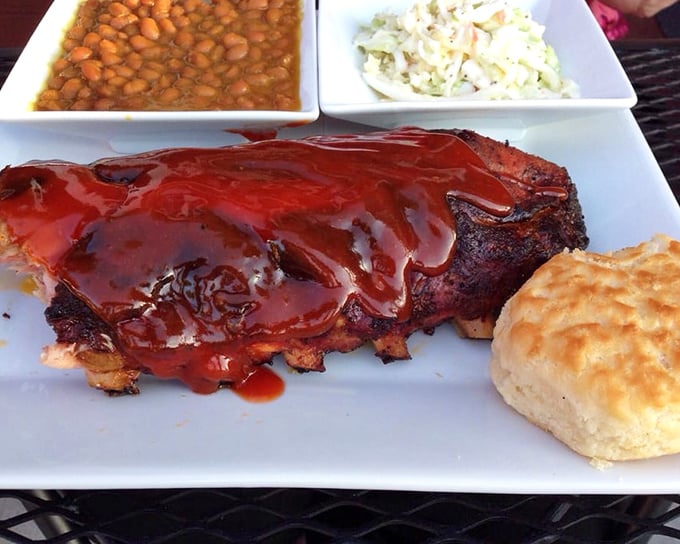 Ribs that don't need a business card—they speak for themselves. That glistening sauce and perfect bark tell you everything about Hood's commitment to proper BBQ.