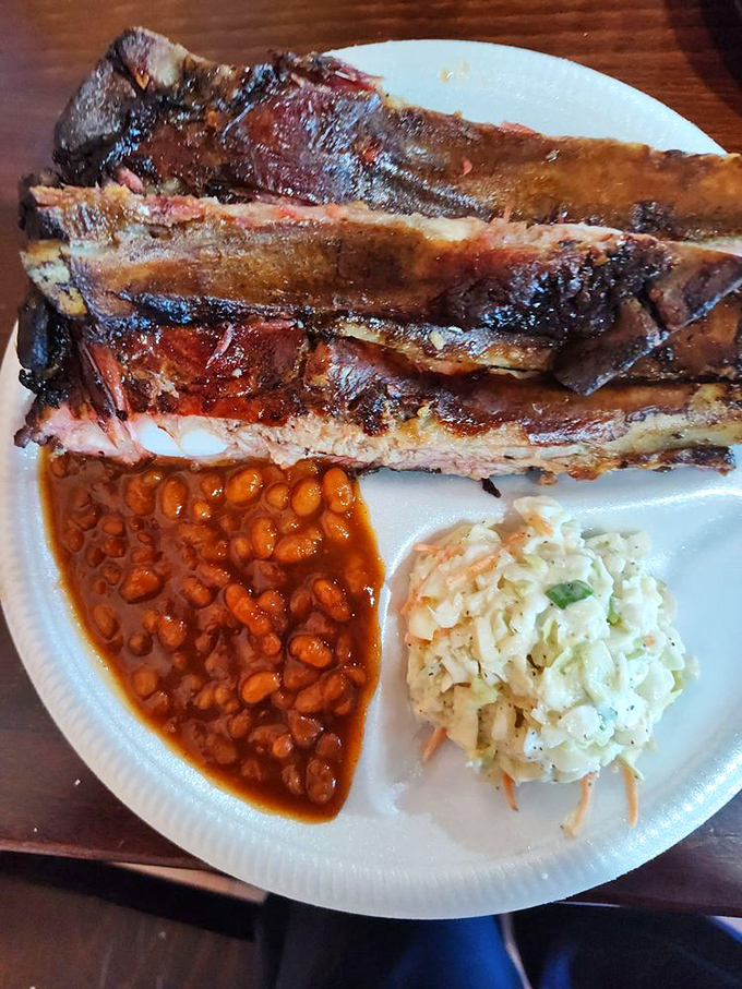 These ribs don't just fall off the bone&mdash;they practically leap onto your fork. The smoke ring is so perfect it could win a beauty pageant.