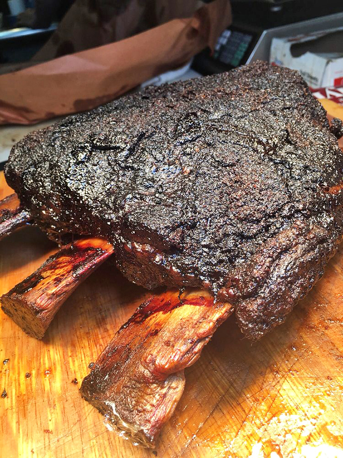 These ribs aren't just smoked, they're transformed into meat candy. That bark contains more flavor than some entire meals I've had in fancy restaurants.