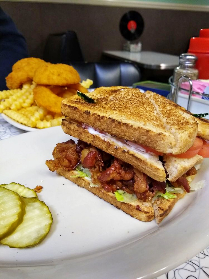 This triple-decker sandwich isn't just lunch&mdash;it's an engineering marvel that requires both hands, several napkins, and zero regrets.