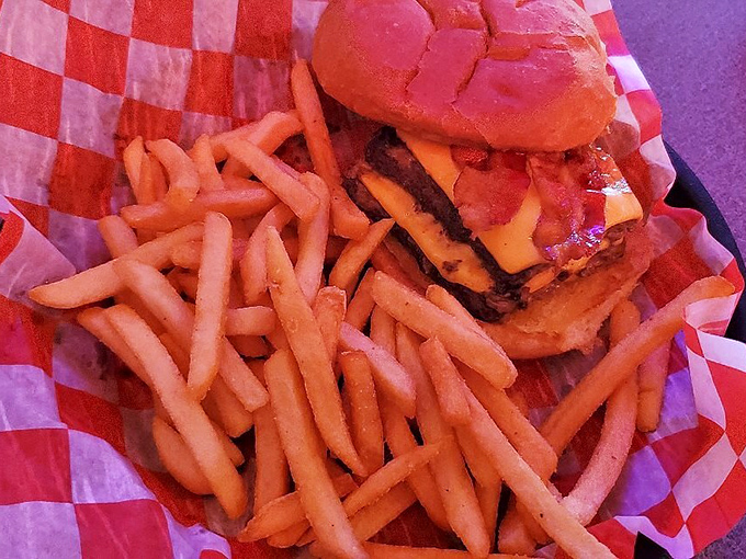 This isn't just a burger&mdash;it's architecture. Layers of beef, cheese, and bacon create a savory skyscraper that makes fast food chains look like they're building with Lincoln Logs.