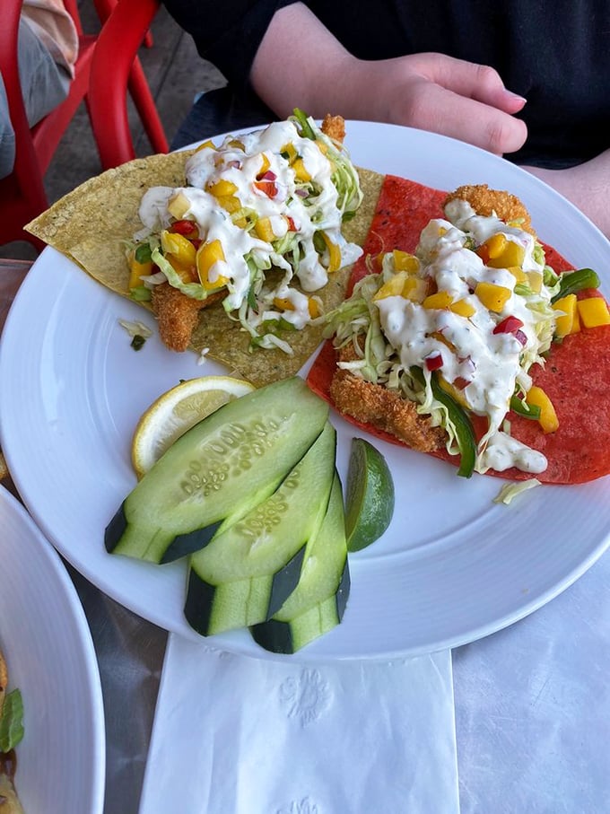 The legendary Baja Fish Tacos arrive like colorful postcards from the coast, complete with crispy fish, fresh mango, and a vacation's worth of flavor.