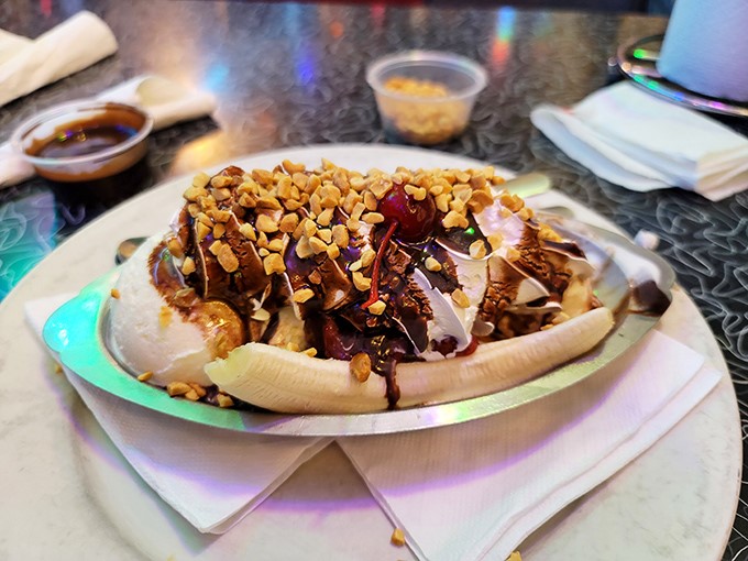 Houston, we have a dessert! This banana split looks like it was designed by someone who understands that life's too short for sensible portion sizes.