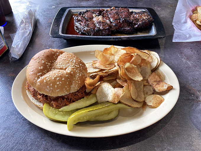 The pulled pork sandwich comes with homemade chips that shatter with each bite &ndash; proof that even the supporting actors in this meat-centric drama deserve standing ovations.