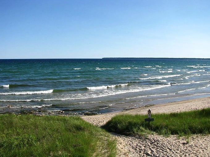 Gentle waves lapping at golden shores. Lake Michigan proves you don't need an ocean to have a beach day that rivals anything in those fancy travel magazines.