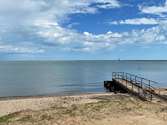 Where lake meets land: A simple wooden pier invites visitors to venture just a bit closer to Lake Erie's endless blue expanse.