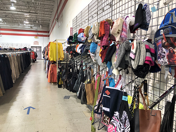 The accessory wall: where scarves, hats, and bags hang like colorful fruit, ripe for the picking and ready to transform any outfit.