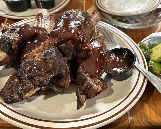 These ribs aren't just falling off the bone&mdash;they're practically jumping onto your fork, glazed with a sauce worth bottling and taking home.