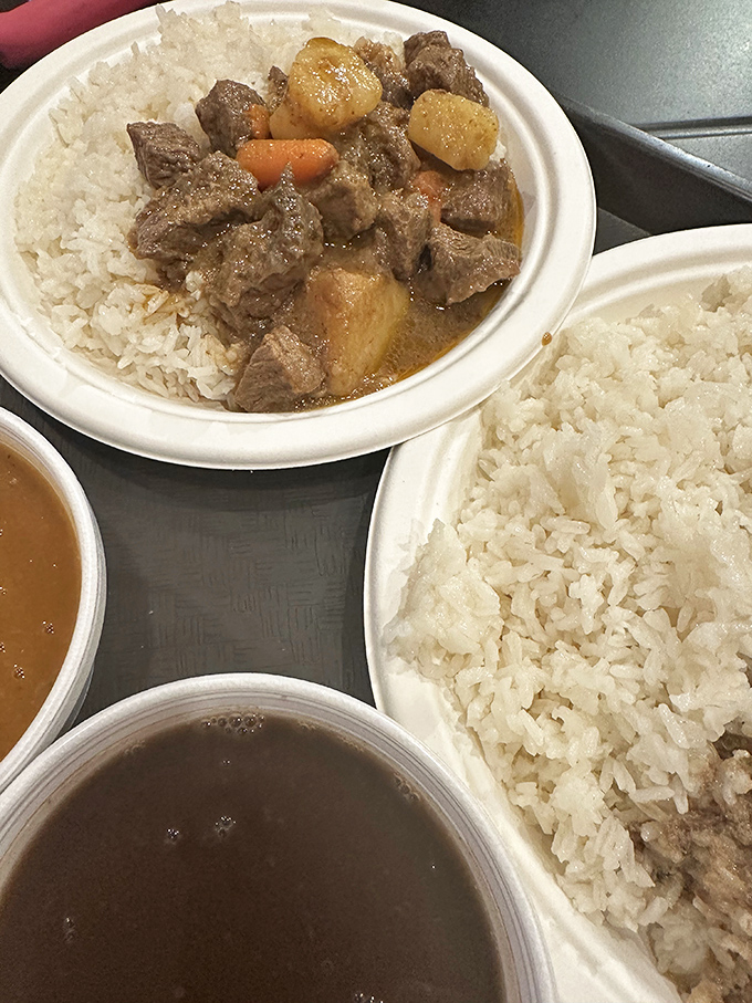 This isn't just beef stew; it's a slow-simmered masterpiece that would make your abuela nod in approval, served over rice that catches every drop.
