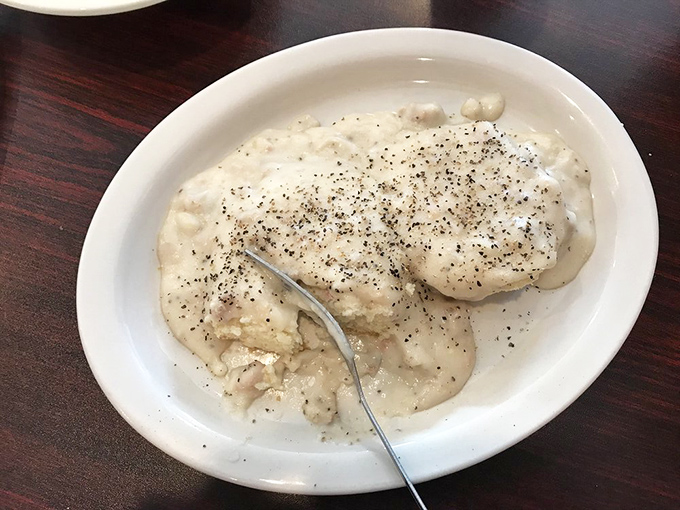 Biscuits and gravy so creamy they could make a Southern grandmother weep with joy. The pepper flecks aren't just decoration&mdash;they're little flavor bombs.