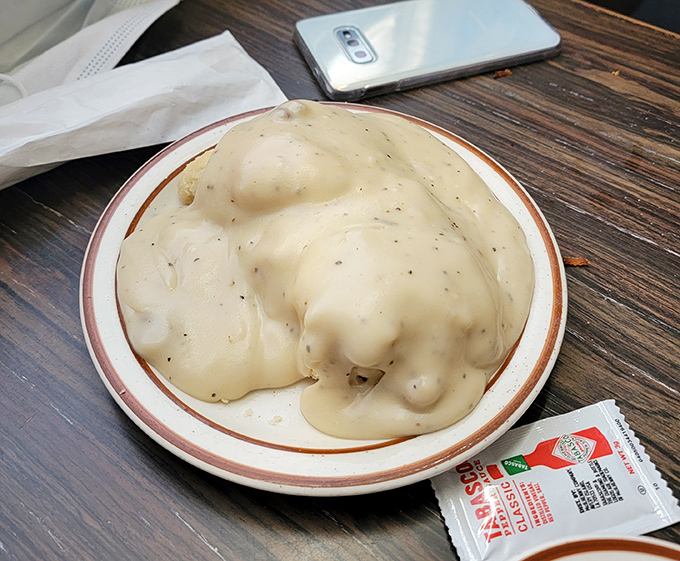 Biscuits and gravy so authentic they should come with their own Southern drawl. This plate doesn't whisper comfort food&mdash;it belts it out like Patsy Cline.