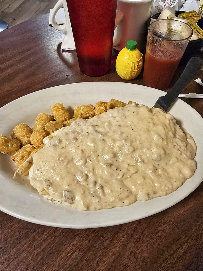 Biscuits and gravy: where Southern comfort meets Delaware hospitality. That creamy, peppery blanket hides chunks of sausage in every bite.