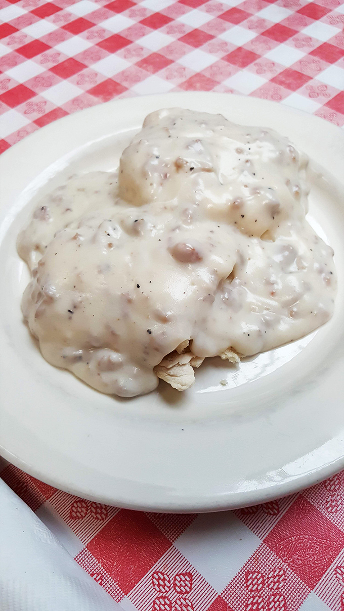 Biscuits and gravy so authentic they should require a birth certificate. This creamy, peppery blanket of comfort could cure any ailment.