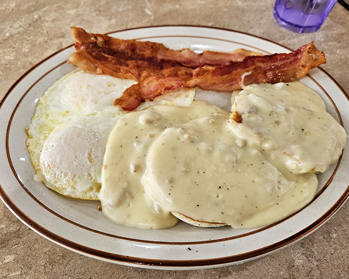 Biscuits and gravy: the breakfast equivalent of a warm blanket on a cold morning. That pepper-speckled gravy cascades over fluffy discs with magnificent abandon.