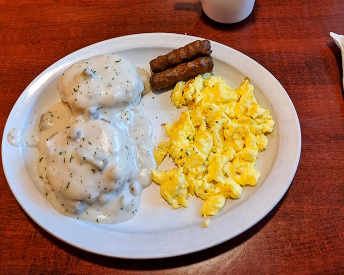 Breakfast of champions or hangover cure? These biscuits smothered in creamy country gravy alongside scrambled eggs might just be both&mdash;comfort on a plate.