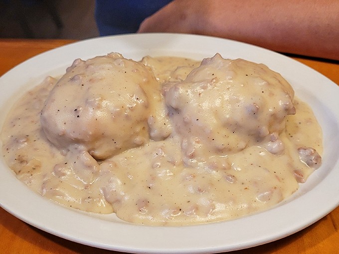 Biscuits and gravy &ndash; the breakfast equivalent of a warm hug. These pillowy biscuits swimming in peppery gravy could solve world peace.