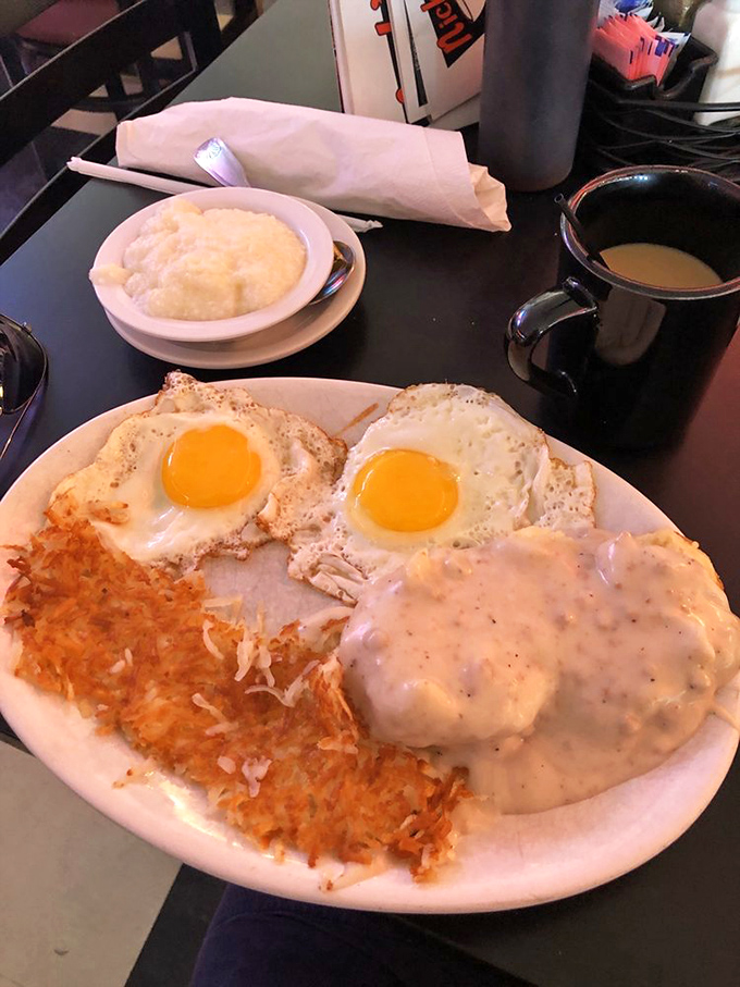 Sunny-side up eggs and creamy gravy&mdash;breakfast's perfect power couple. The hash browns are crispy enough to make a satisfying crunch heard 'round the diner.