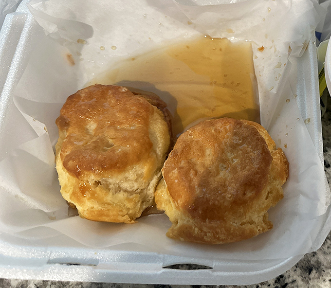These honey biscuits aren't just sides—they're supporting characters deserving their own spinoff show. Fluffy interiors with golden tops that make you question why you'd ever eat anything else.