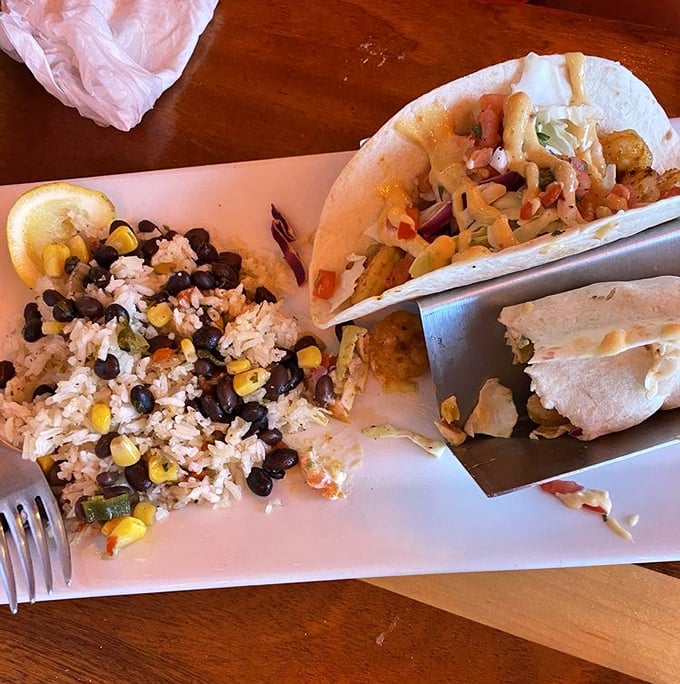 Blackened shrimp tacos with a side of vacation memories. That rice and bean mixture isn't just a side&mdash;it's practically its own attraction.