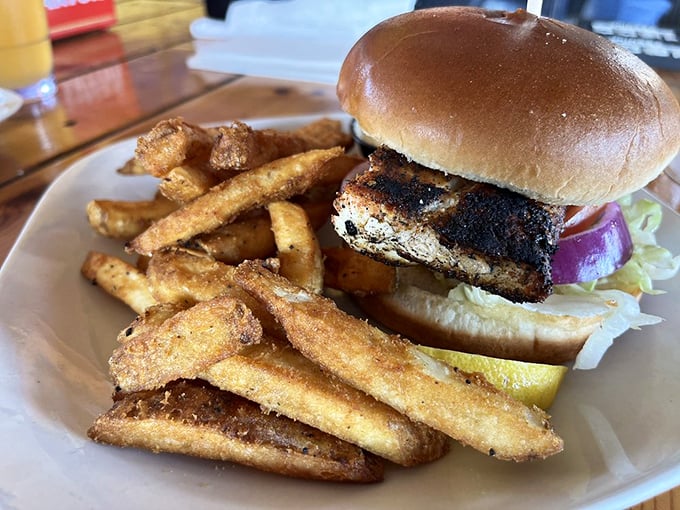 The blackened mahi sandwich comes with a side of crispy fries that might just upstage the star of the plate. 
