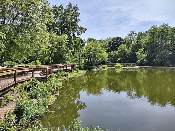 Blue Limestone Park's serene pond reflects more than just clouds&mdash;it mirrors the town's appreciation for peaceful green spaces amid busy lives.