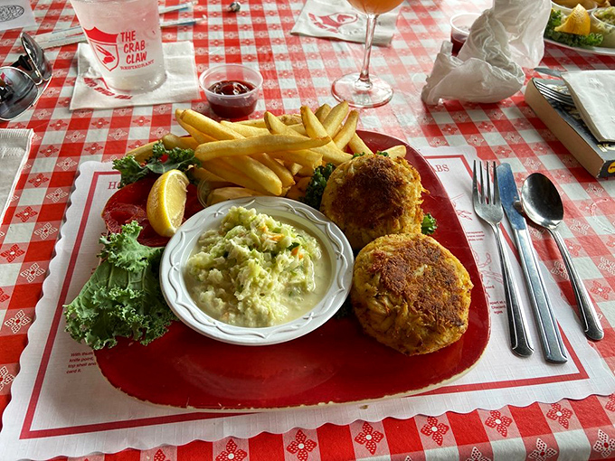 Golden-brown crab cakes that could make a native Marylander weep with joy, paired with classic sides that know their supporting role.