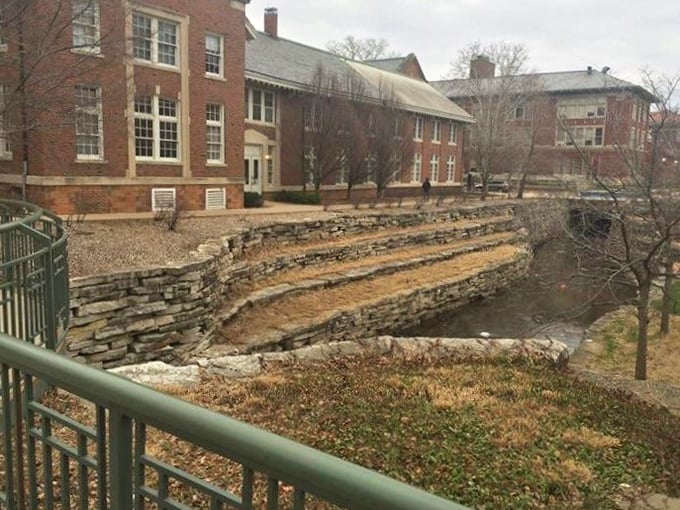 This stone amphitheater along Boneyard Creek offers a peaceful urban oasis &ndash; nature's version of stadium seating in the heart of campus.