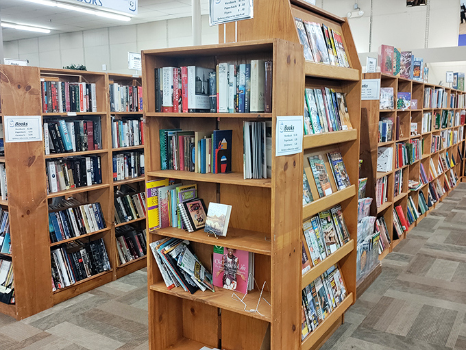 The book section—where literary dreams come true for a fraction of the cost, and where dog-eared paperbacks find their second chance at love.
